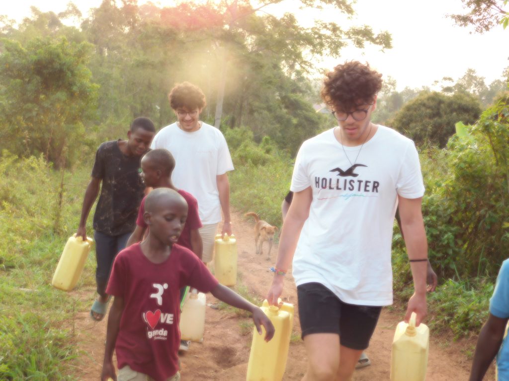 Fetching Water-Volunteer Activity - Uganda Charity Organization - Help ...